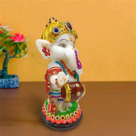 Standing Ganesh Idol Playing Dholak For Ganesha Sankashti Pooja