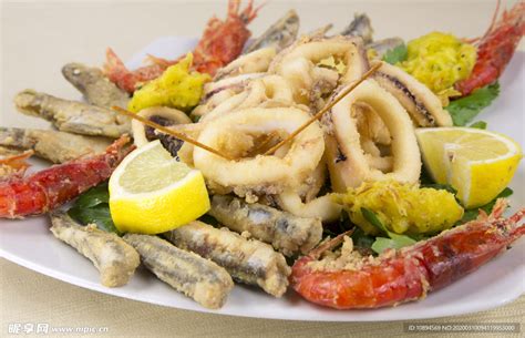 油炸鱿鱼摄影图 西餐美食 餐饮美食 摄影图库 昵图网