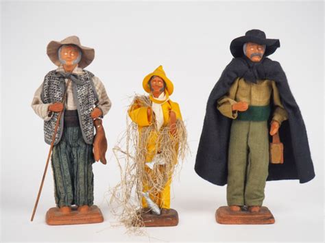 Lot de santons de Provence modernes en terre cuite figurant deux paysans et au prix de à