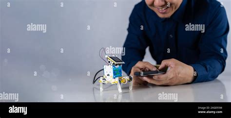 Robot Technology And Stem Education Class Concept Robots With Bright