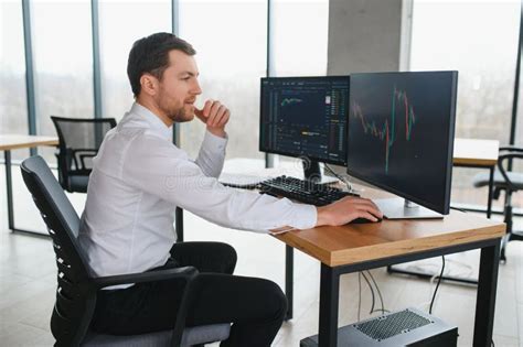 Serious Business Man Trader Analyst Looking At Computer Monitor Investor Broker Analyzing