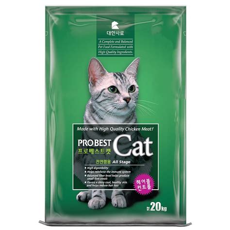A Bag Of Cat Litter Sitting On Top Of A White Floor Next To A Green Wall