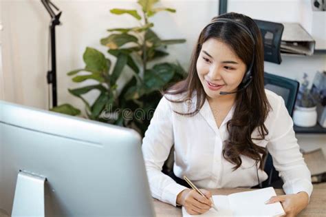 friendly call center agent providing customer support with headset in