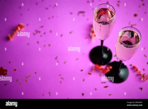 Two Glasses Full Of Sparkling Champagne Wine With Golden Decoration
