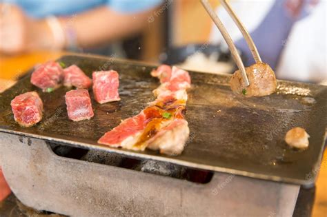 Premium Photo Top View Of Dice Beef And Striped Calf Beef On The Pan
