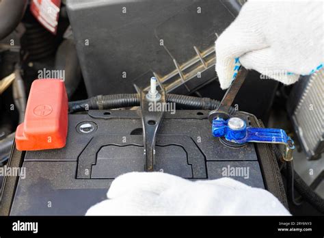 The Driver Is Replacing The Car Battery Battery Terminal Installation Stock Photo Alamy