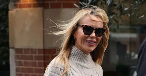 Amanda Holden Flashes Toned Figure As Crop Top Flies Up In Jaw Dropping