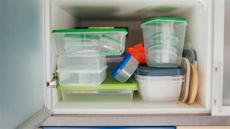 A Dollar Tree Napkin Holder Is The Trick To Clutter Free Kitchen Cabinets