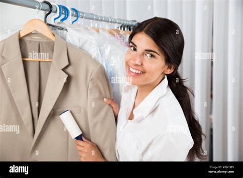 Woman Removing Her Clothes Hi Res Stock Photography And Images Alamy