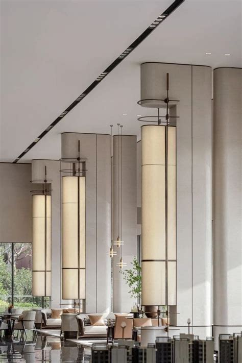 Pin By Sonya Savelyeva On Retreat Lobby Design Hotel Interiors Column Cladding
