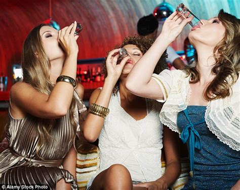 People Taking Shots Of Alcohol