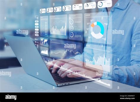 Analyst Working With Financial Report And Business Analytics Dashboard