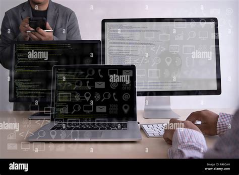 man work coding software developer programmer is coding on a desktop