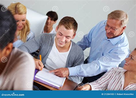 Teacher Helping In Class Stock Image Image Of Education 21284183