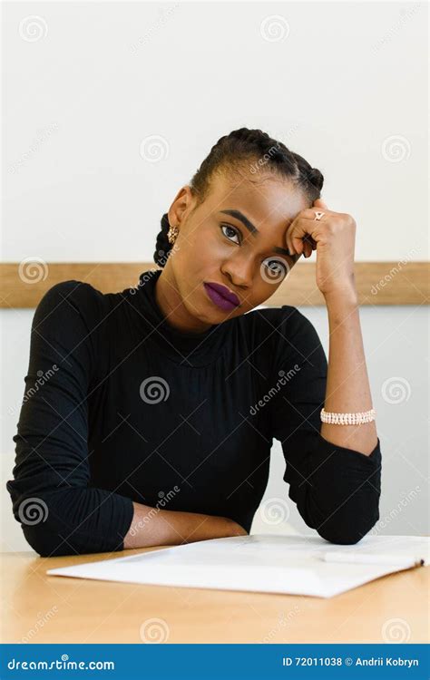 Sad Worried African Or Black American Woman Holding Her Forehead With