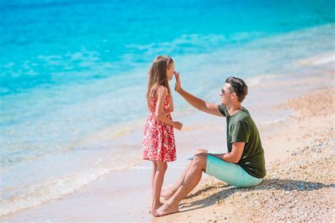 Premium Photo Full Length Of Father And Daughter On Beach