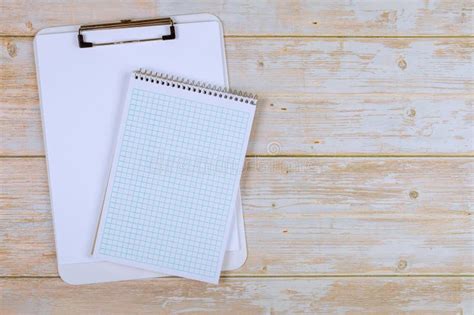 On Modern Office Desk A Notebook Are Placed For Use While Working