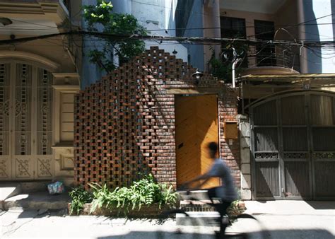 Perforated Brick Gable Screens Courtyard In Front Of Compact Hanoi