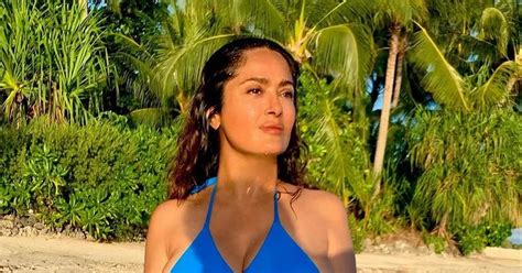 Salma Hayek Appears Ageless In Low Cut Plunging Swimsuit To Celebrate