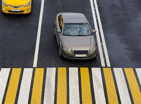 Premium Photo Car Stopped At The Zebra Crossing
