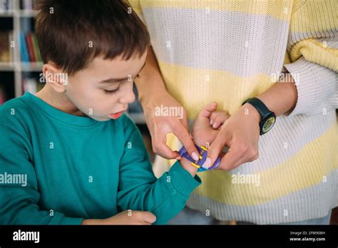 Mom Gives Her Son His First Watch Learning To Determine The Time By