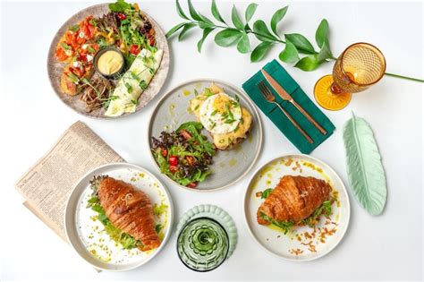 Premium Photo An Exquisite Set Of Breakfast Dishes Croissants Toast