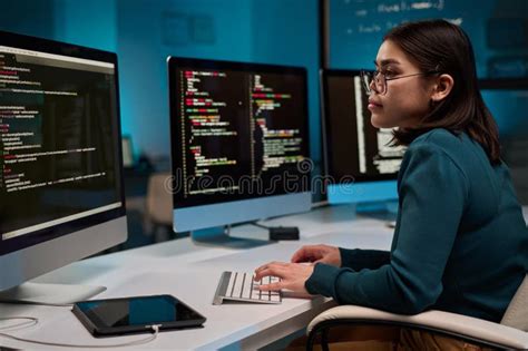 Female Computer Programmer Typing At Keyboard Stock Image Image Of Glasses Young 328697425