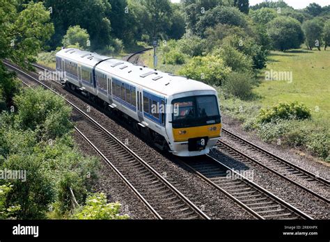 A Chiltern Railways Class 165 Diesel Train At Hatton North Junction