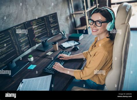 profile side view portrait of attractive cheery skilled girl editing