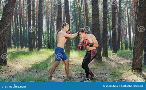 In Boxing Gloves Young Athletic Men With Bare Naked Torsos Box