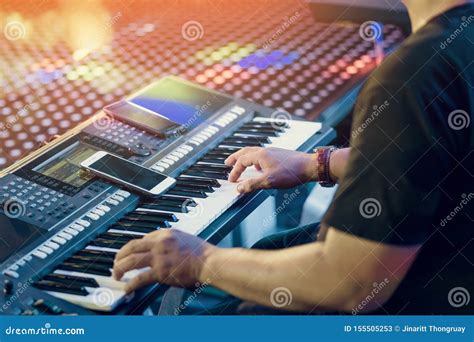 Musician Play Electronic Keyboard Synthesizers By Using Smartphone As