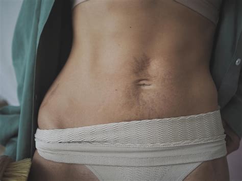 Premium Photo Midsection Of Shirtless Woman