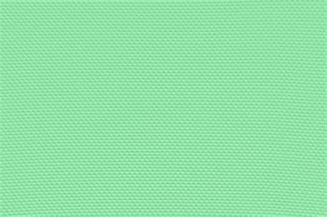 Premium Photo Light Emerald Green Background From A Textile Material