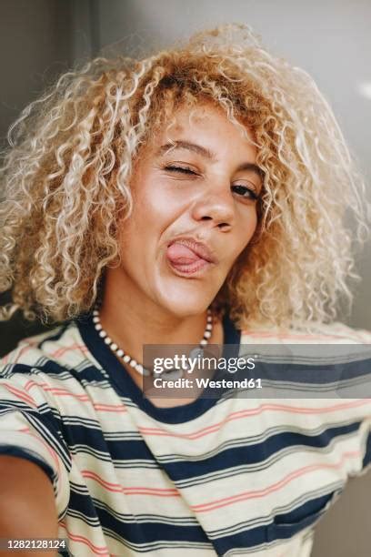 Tongue Out Selfie Photos And Premium High Res Pictures Getty Images