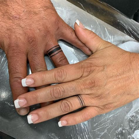 30 Unisex Wedding Ring Tattoos For Couples Tattoo Inspo Hub
