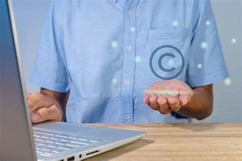 Man With Virtual Copyright Symbol Copyright Intellectual Property