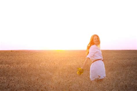 Premium Photo Girl On A Wheat Field