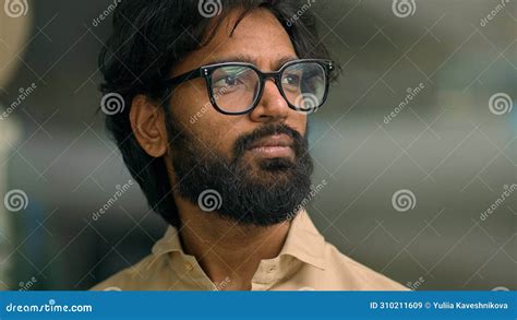 Serious Thoughtful Arabian Bearded Man In Glasses In Office Corporate Company Thinking Looking