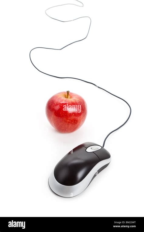Computer Mouse And Red Apple Close Up Stock Photo Alamy