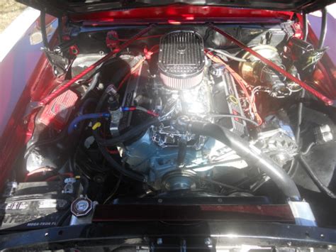 Seller Of Classic Cars 1969 Pontiac Firebird Candy Apple Red Over Silver Base Black