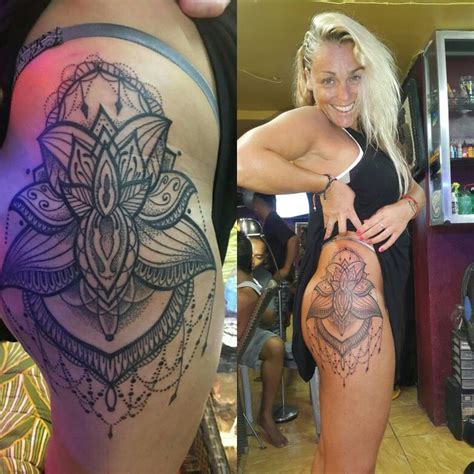 A Woman Showing Off Her Thigh Tattoos In Front Of A Man S Back And Side