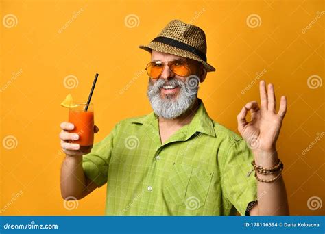 Bearded Grandpa In Hat Green Shirt Sunglasses Smiling Showing Okay