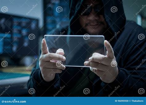 Hacker Using Blank Clear Glass Tablet With Blue Dark And Grain P Stock