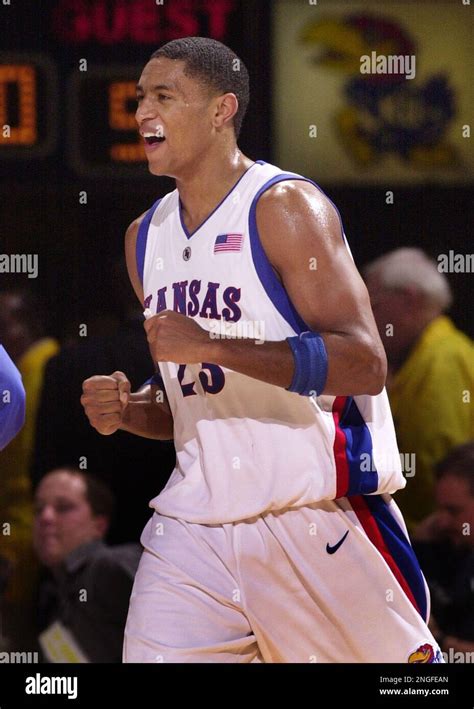 Kansas Forward Wayne Simien 23 Celebrates As He Walks Off The Floor Following A 65 56 Win Over