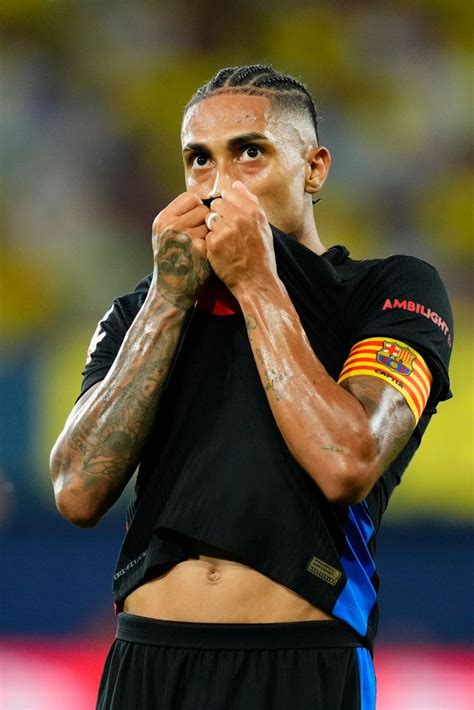 Raphinha Kissing The Barca Badge After Scoring A Brace Against