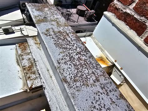 leveling and separating steel i beams on rooftop copings dupont