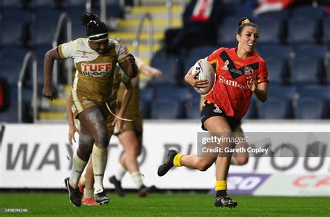 Anika Butler Of Papua New Guinea Breaks Through To Score Their Teams