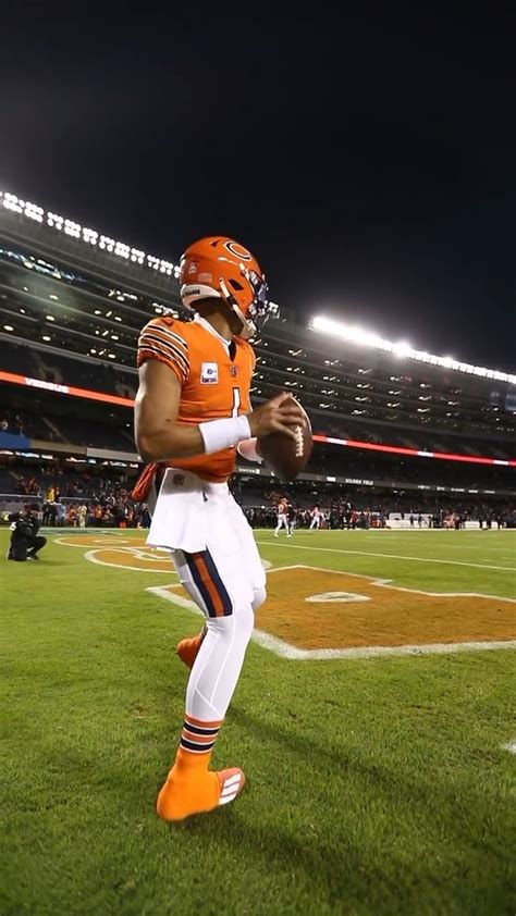 Justin Fields Warming Up In Orange Throwback Uniform Before Commanders