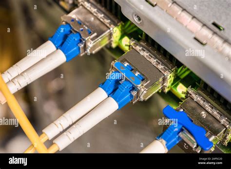 The Fiber Optic Wires Are Connected To The Optical Interfaces Of The Central Router Internet