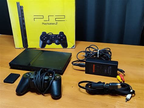 Sony Sony Playstation 2 Slim SCPH 70004 16 Games Video Game